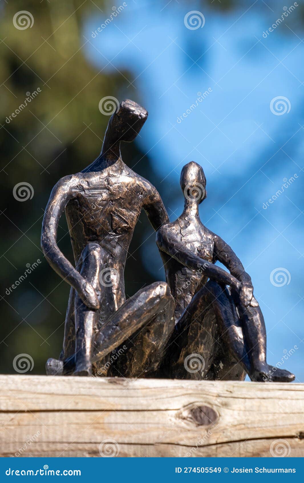 Statue of a Man and a Woman Sitting Together Stock Image - Image of ...