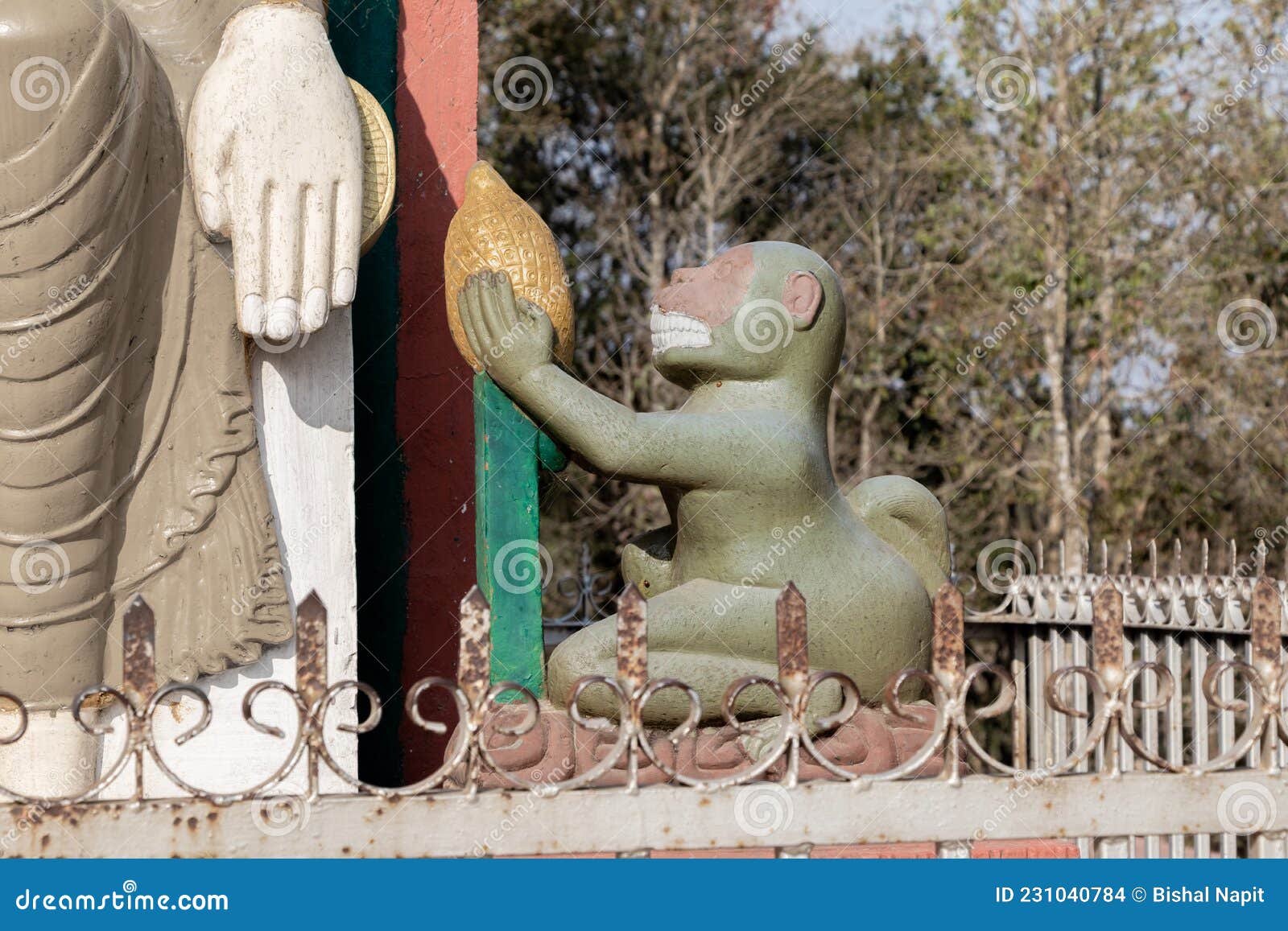 The Statue of a Monkey beside the Statue of Buddha at Shreenagar Stock ...