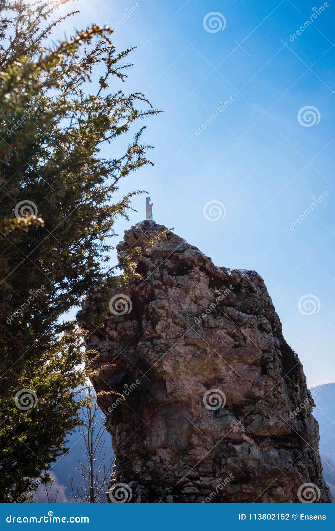 Statue of the Most Holy Virgin Mary Over a Rock, Bathed in Rays Stock ...