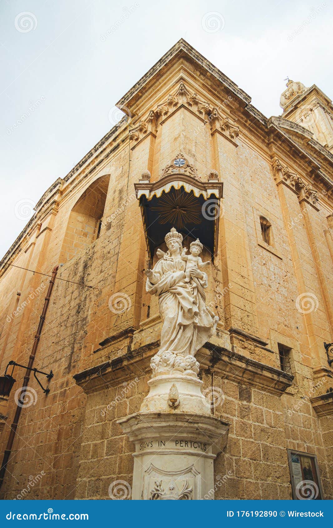 Statue of a Mother and a Child in Front of an Old Building of Mdina ...