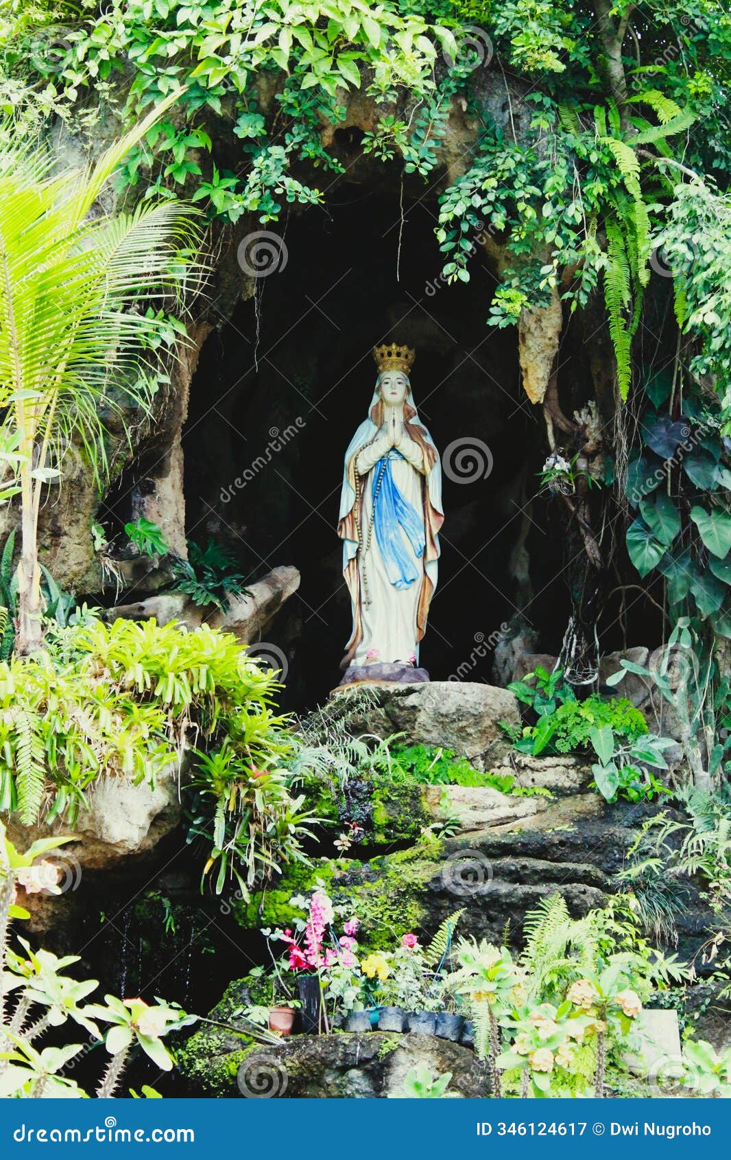 A Statue of Mother Mary in a Grotto Stock Image - Image of catholic ...