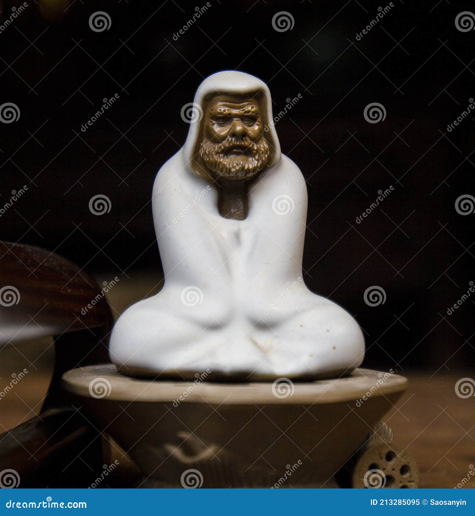 A Statue of an Old Man Sitting in a White Robe Stock Image - Image of ...