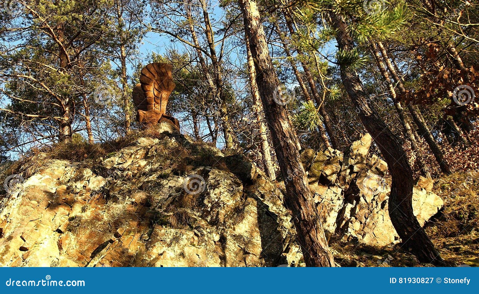 Statue of a Phoenix in the Midst of a Forest Stock Image - Image of ...