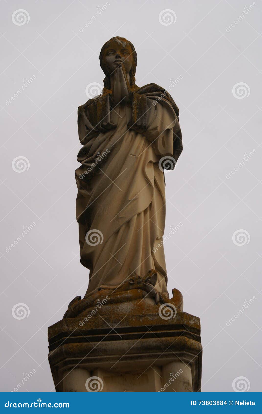 Statue with praying hands stock photo. Image of craftmanship - 73803884