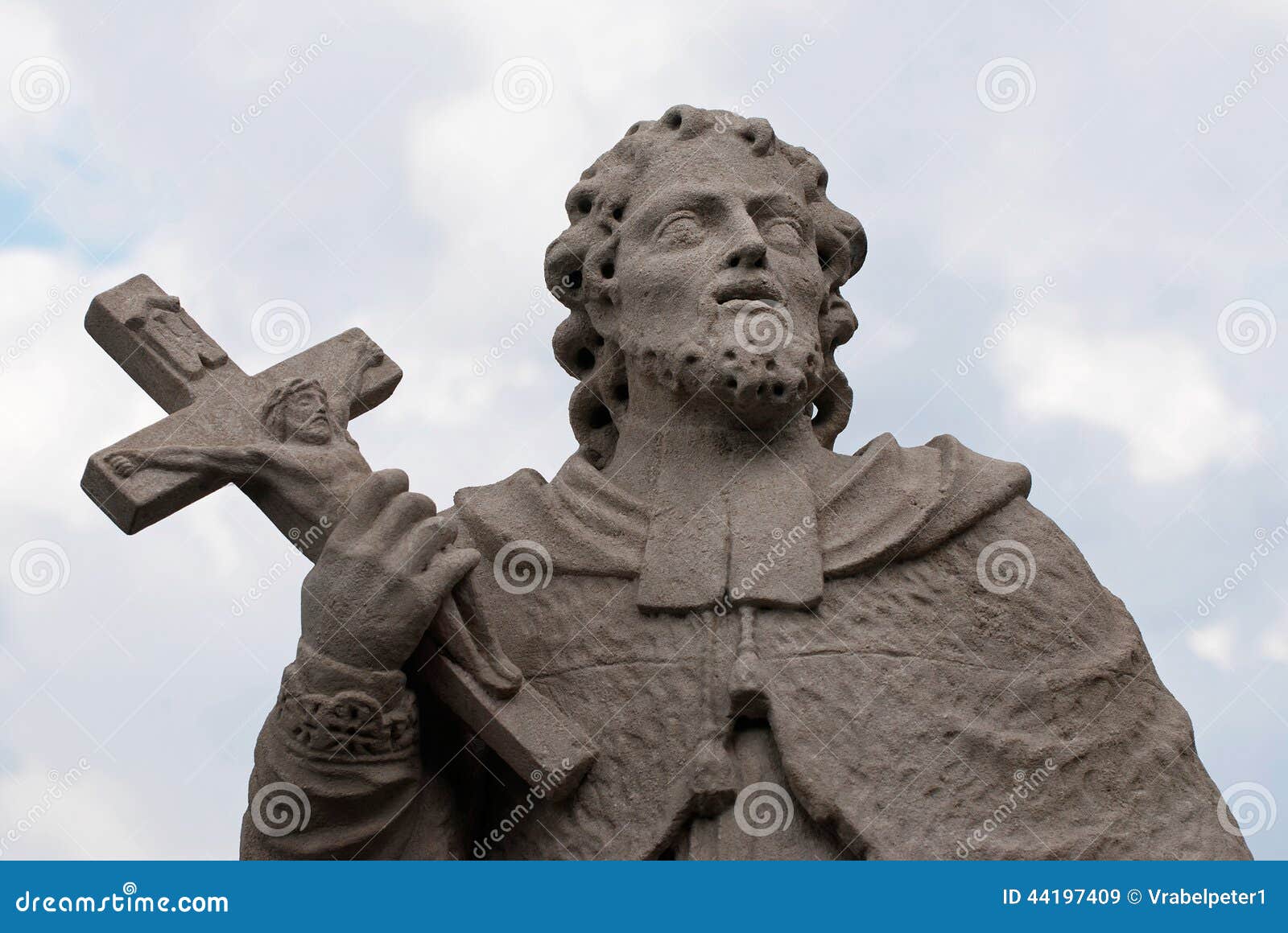 Statue of saint with cross stock image. Image of christianity - 44197409