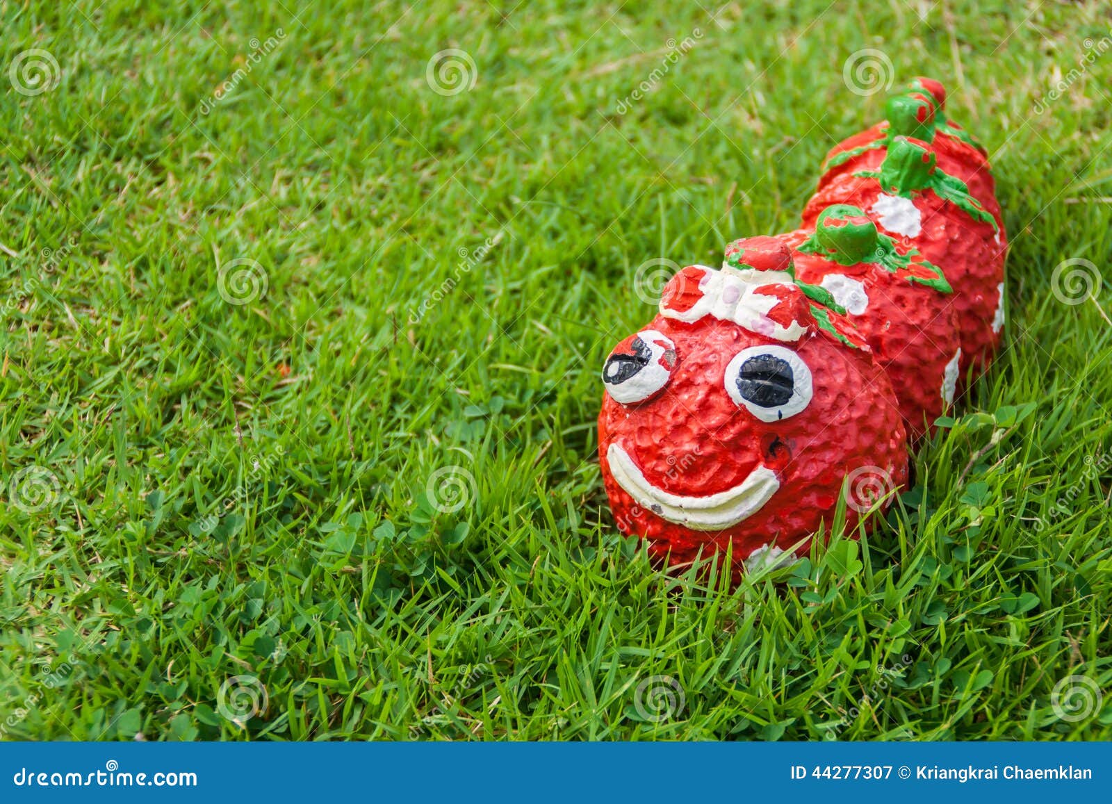 Statue of Smile Red Worm in the Garden Stock Image - Image of outdoor ...