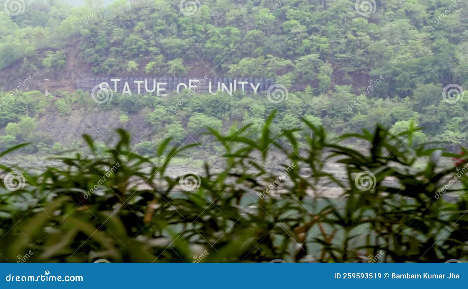 Statue of Unity Board Written at Green Mountain with River at Morning ...