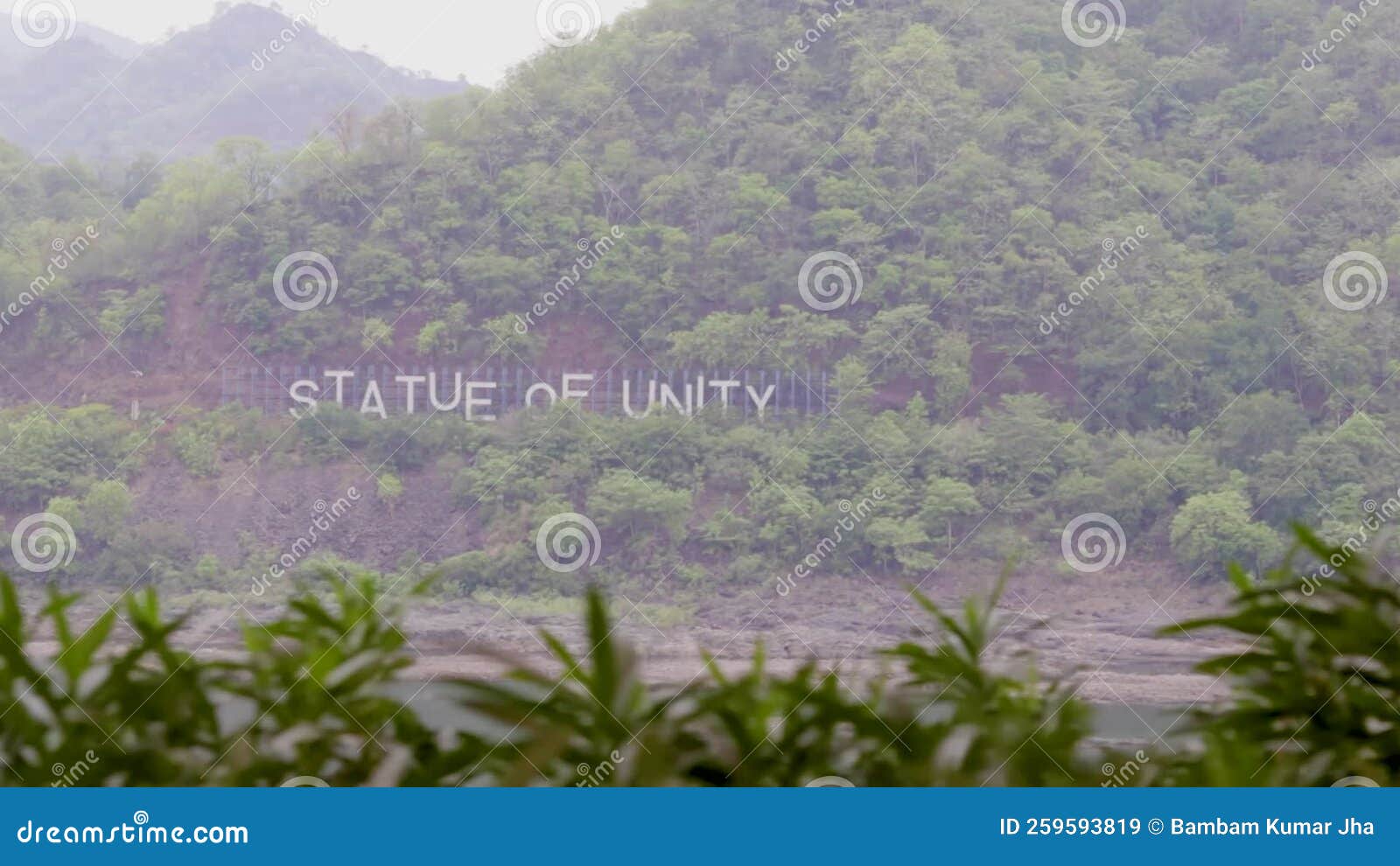 Statue of Unity Board Written at Green Mountain with River at Morning ...