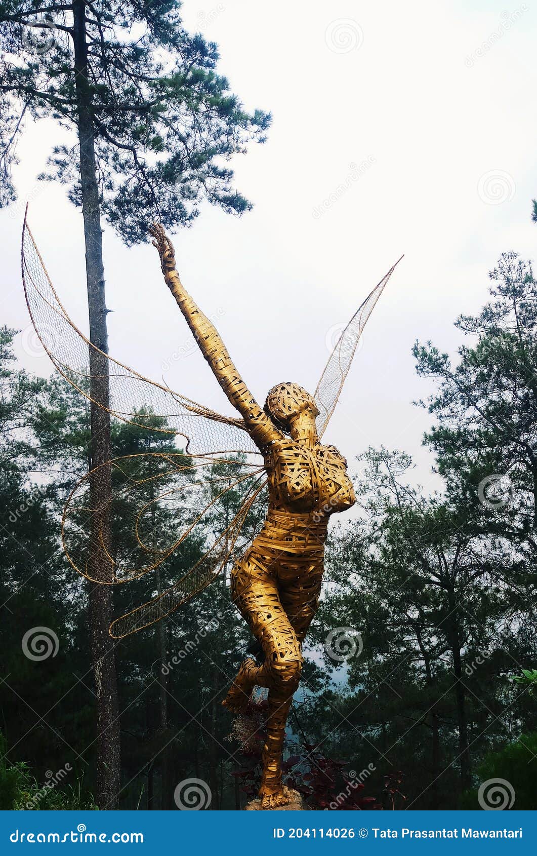 A Statue of Winged Woman Trying To Fly Editorial Photo - Image of ...