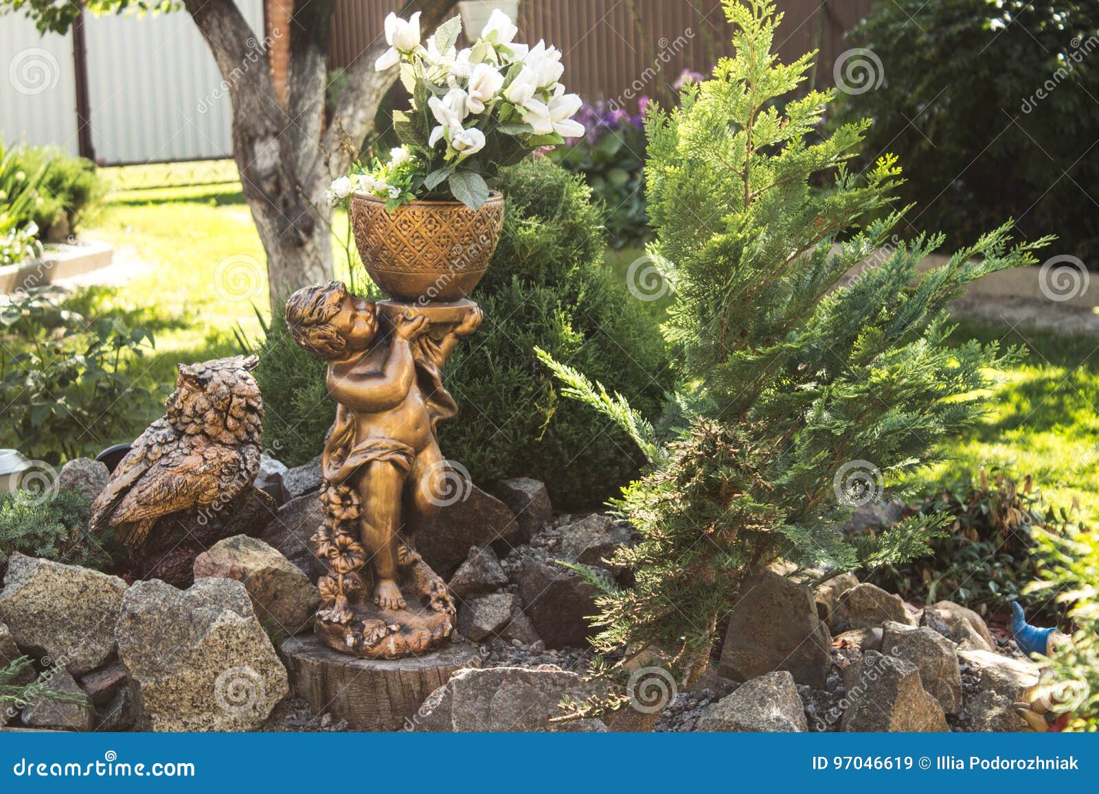 Statue of a Woman with a Flower Pot in the Garden Stock Image - Image ...