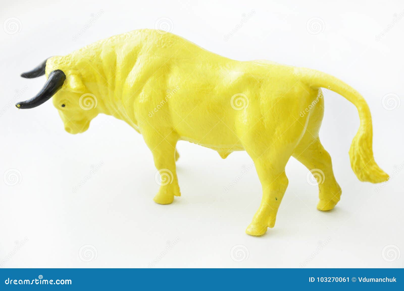 Statue of a yellow bull stock image. Image of statue - 103270061