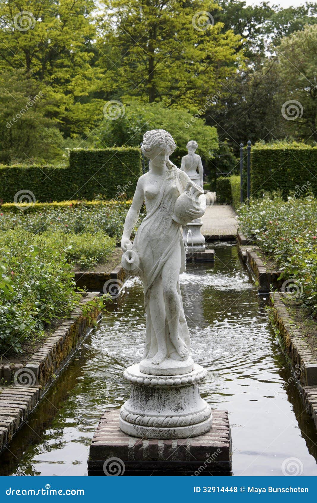 Statues and fountain stock photo. Image of garden, park - 32914448