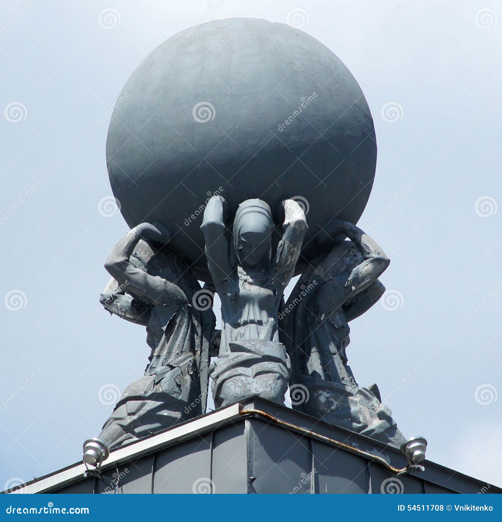 Statues holding a globe stock photo. Image of kiev, round - 54511708