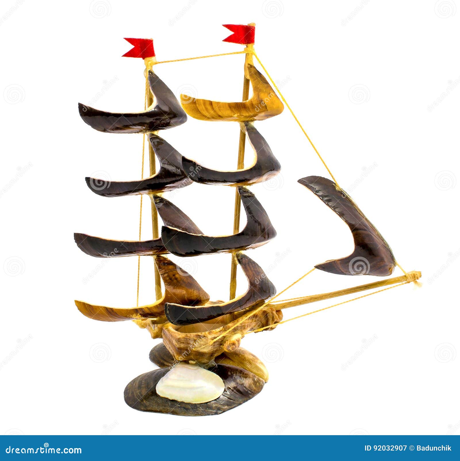 Statuette of Ship Made from Shell Isolated on a White Background Stock ...