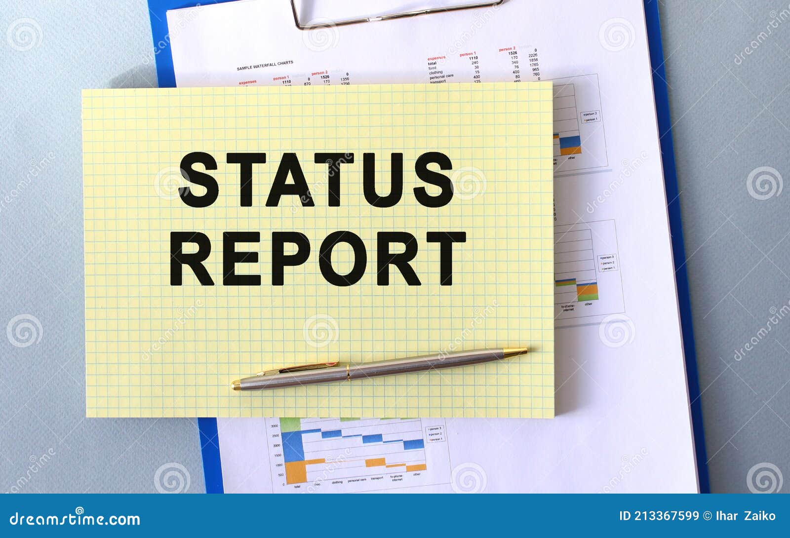 STATUS REPORT Text Written on Notepad with Pencil. Notepad on a Folder ...