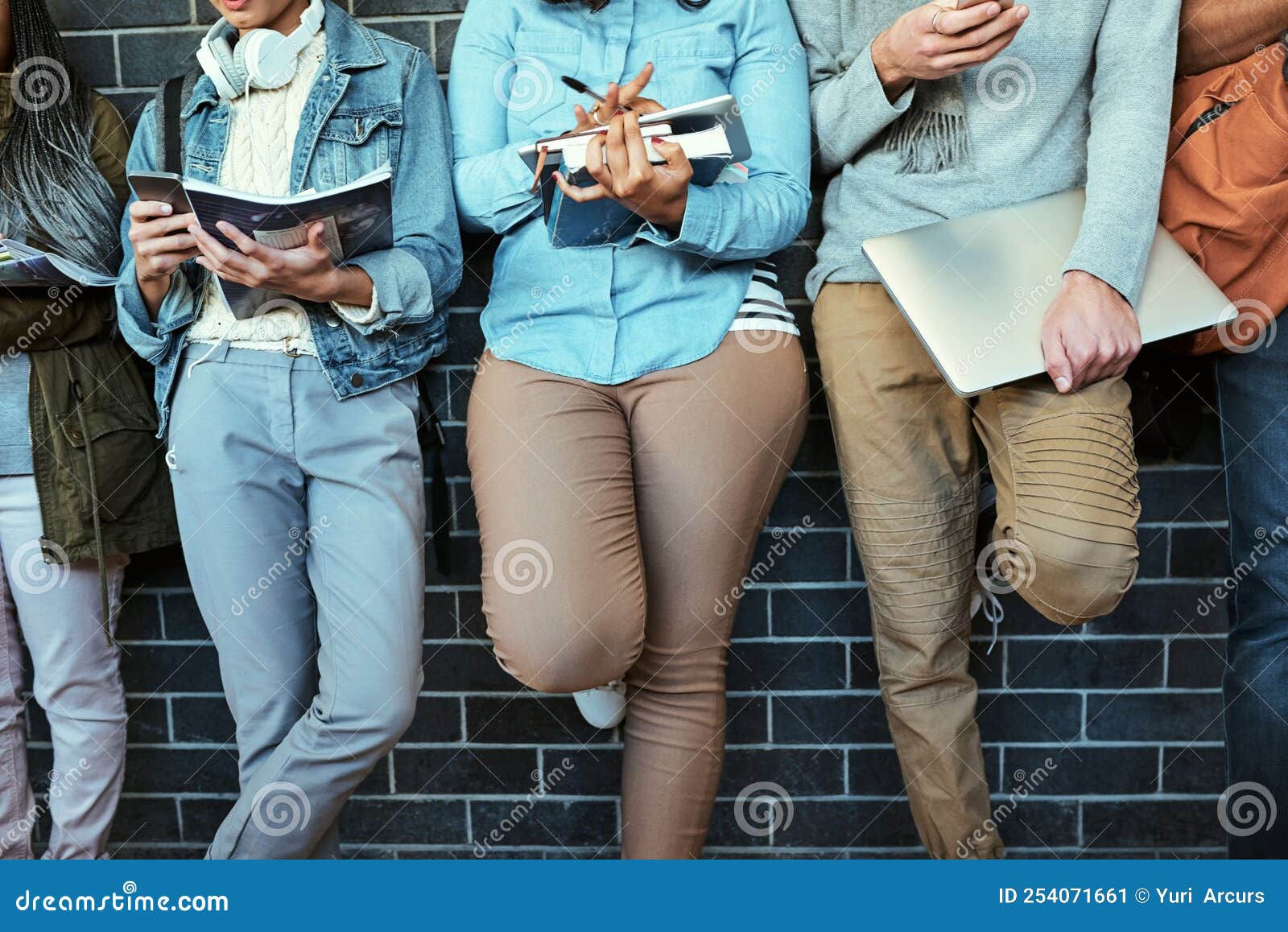 They Stay Connected. a. Group of Unrecognizable University Students ...