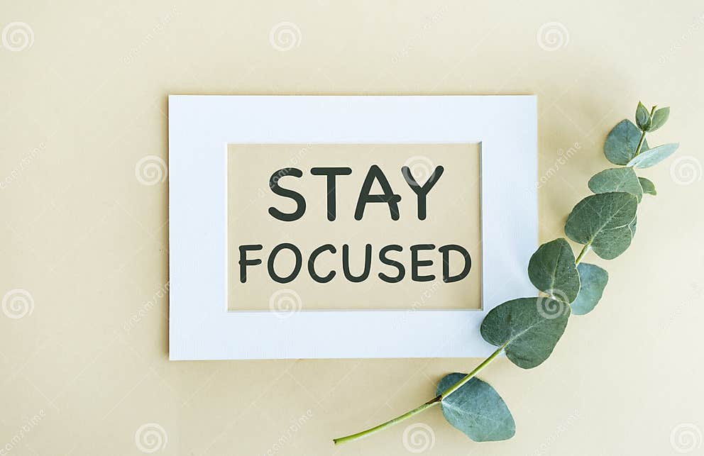 Stay Focus Text on White Notepad with Envelope on Yellow Background ...