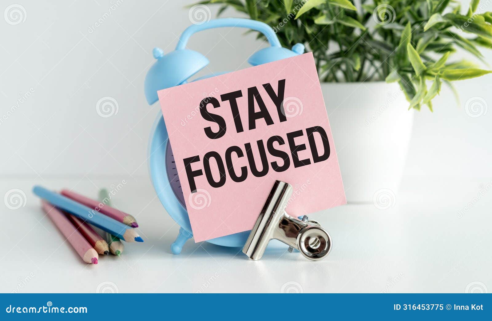 Stay Focused Write on Sticky Notes on on a Clock in the Form of an ...
