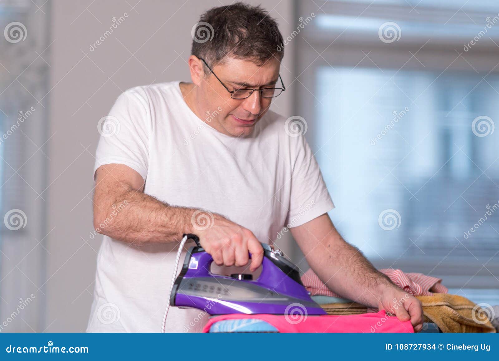 Stay-at-home dad ironing stock photo. Image of ironing - 108727934