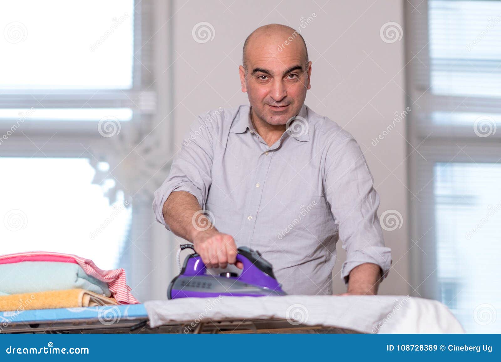 Stay-at-home dad ironing stock image. Image of housework - 108728389