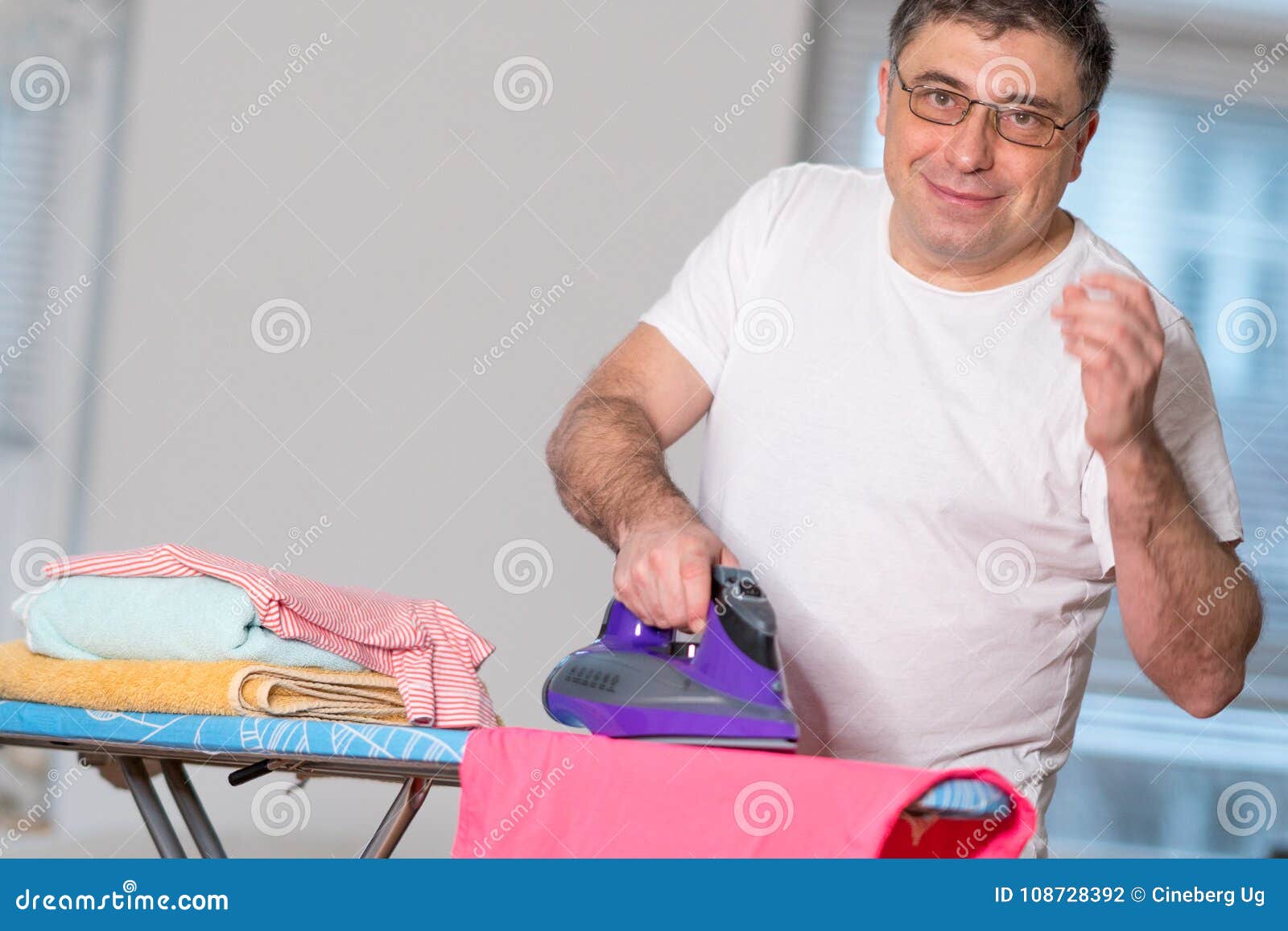 Stay-at-home dad ironing stock photo. Image of caregiver - 108728392