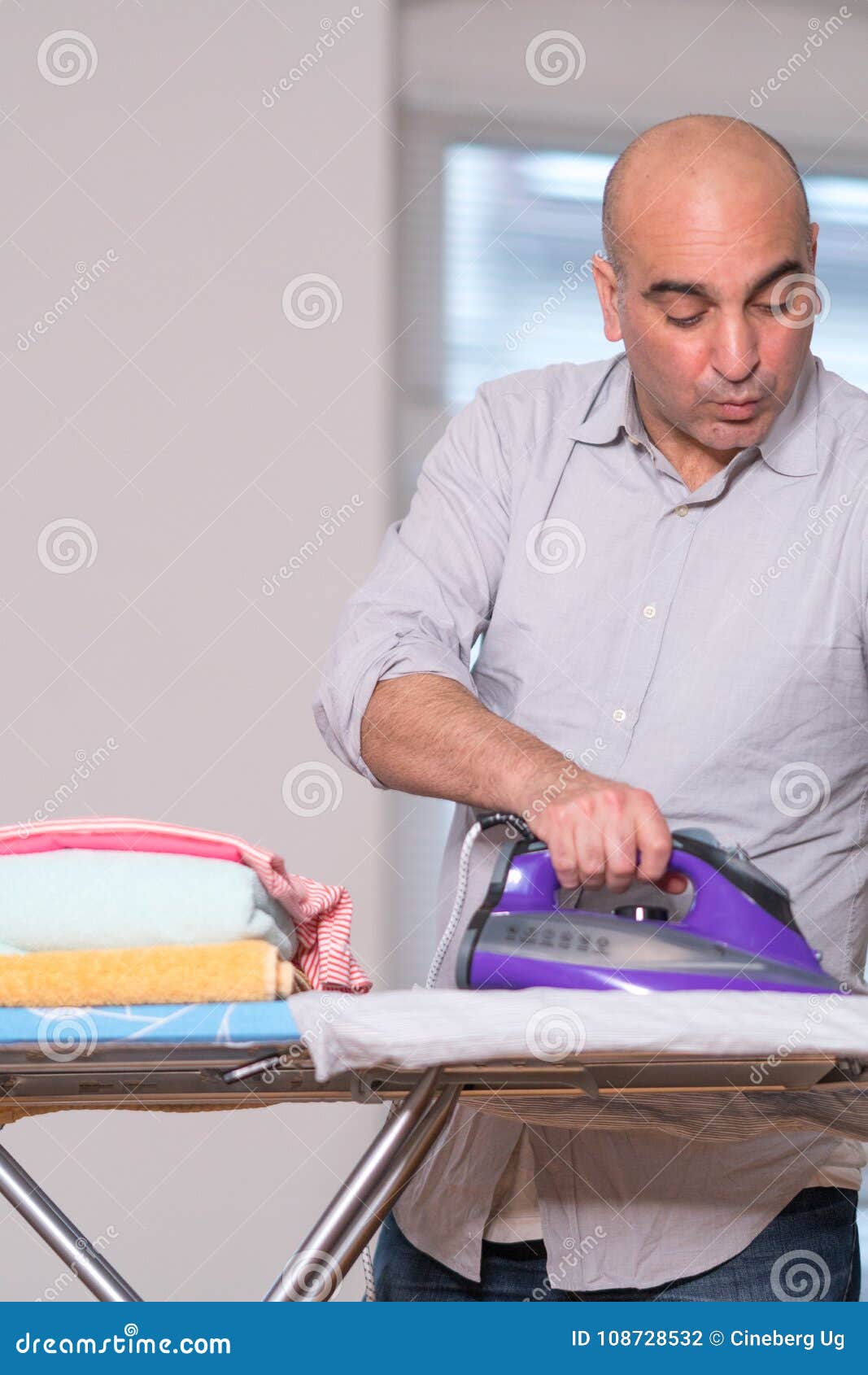 Stay-at-home dad ironing stock photo. Image of duties - 108728532