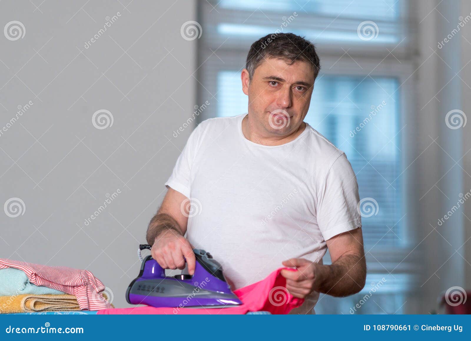 Stay-at-home dad ironing stock image. Image of breadwinner - 108790661