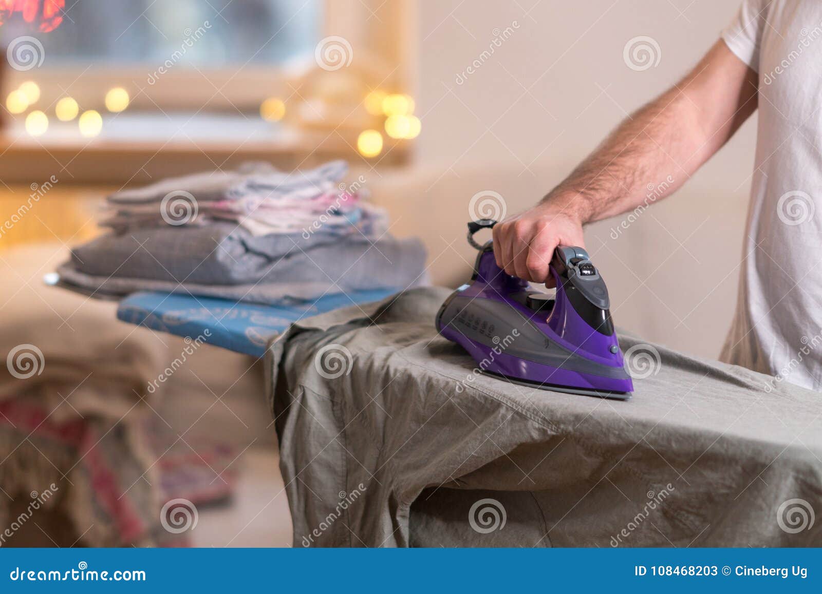 Stay-at-home dad ironing stock image. Image of domestic - 108468203