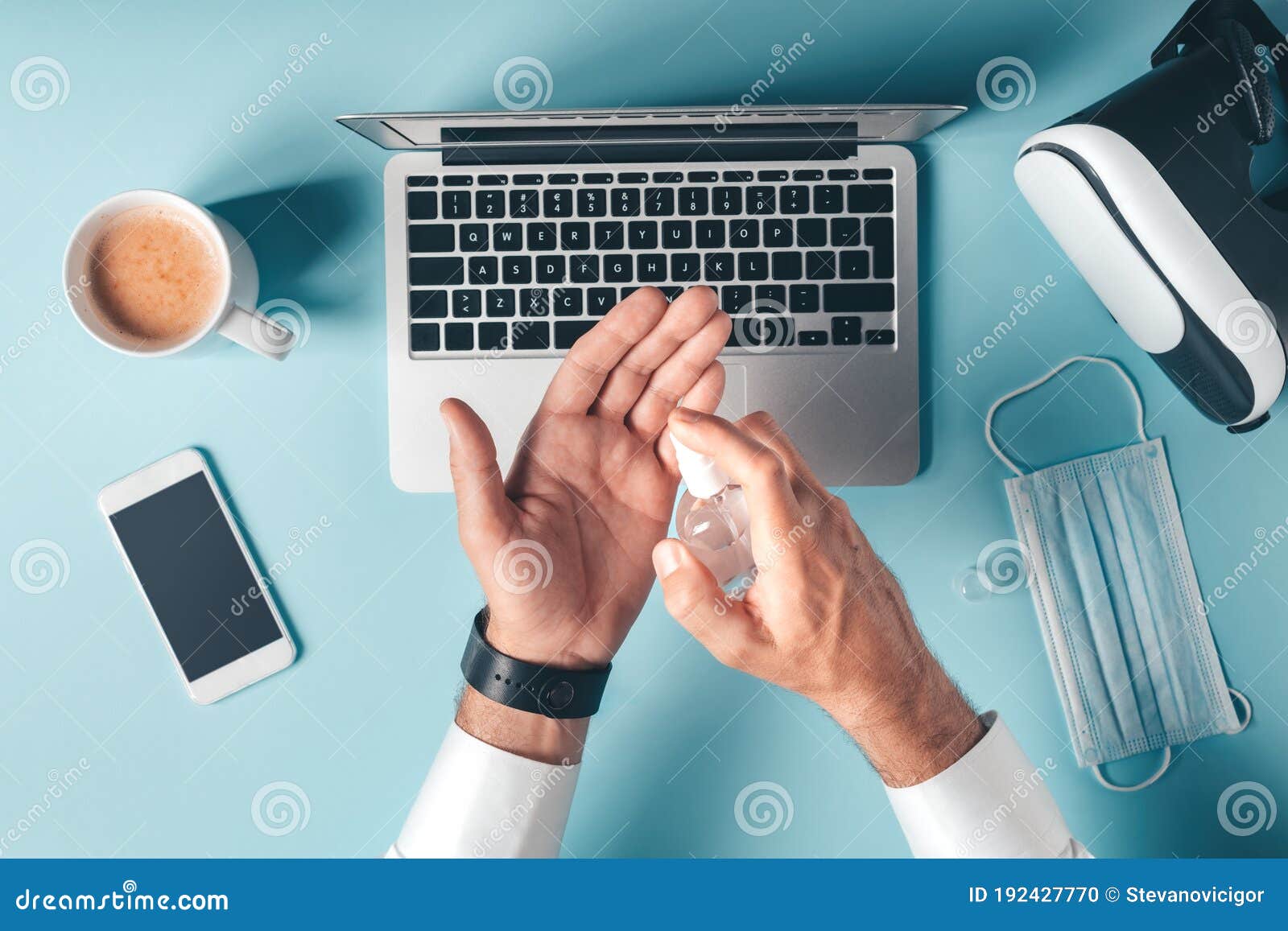 Stay Safe, Businessman Using Disinfectant Spray in Office while Working ...