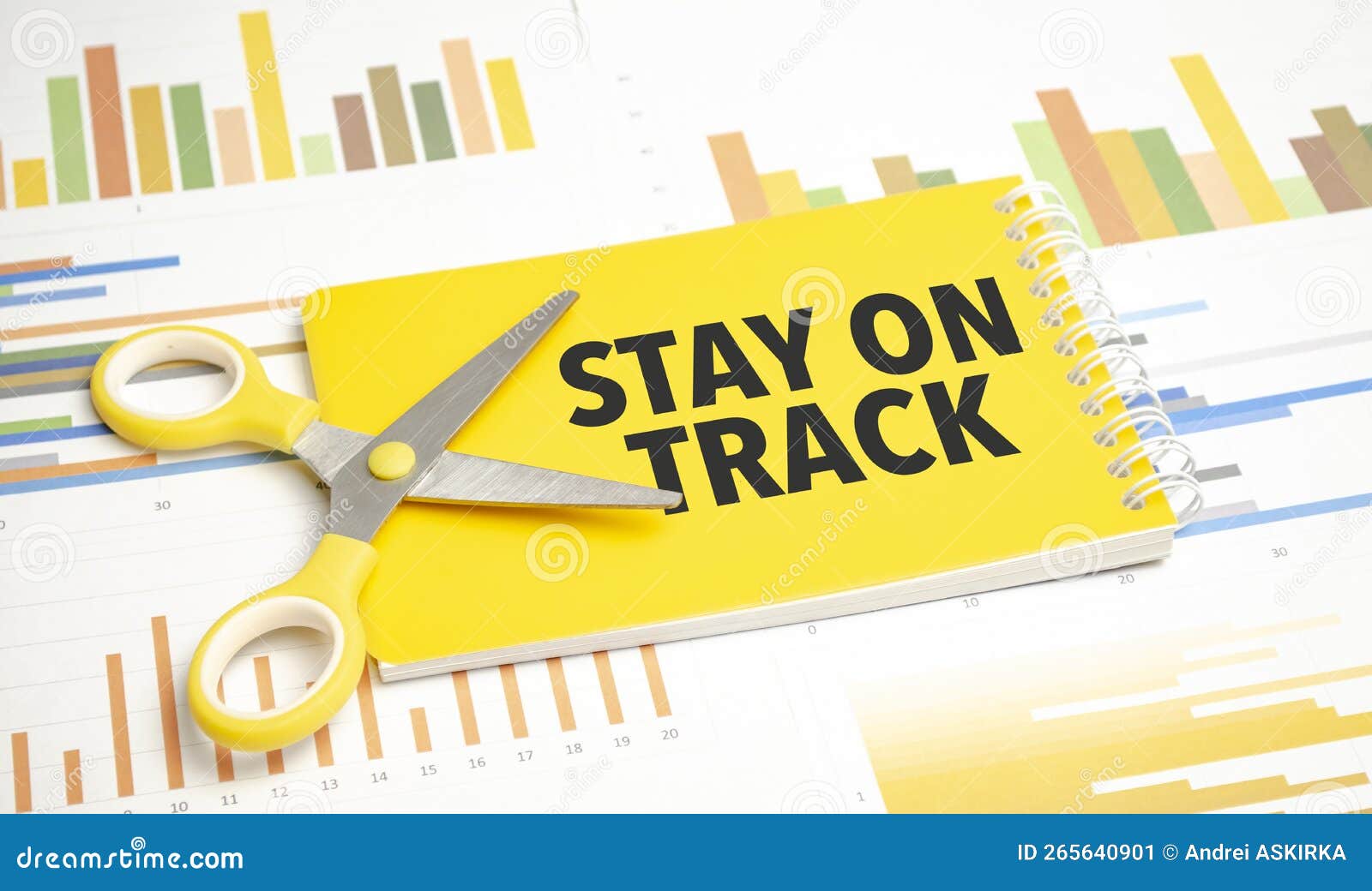 Stay on Track . Words on Yellow Notebook and Charts Stock Image - Image ...