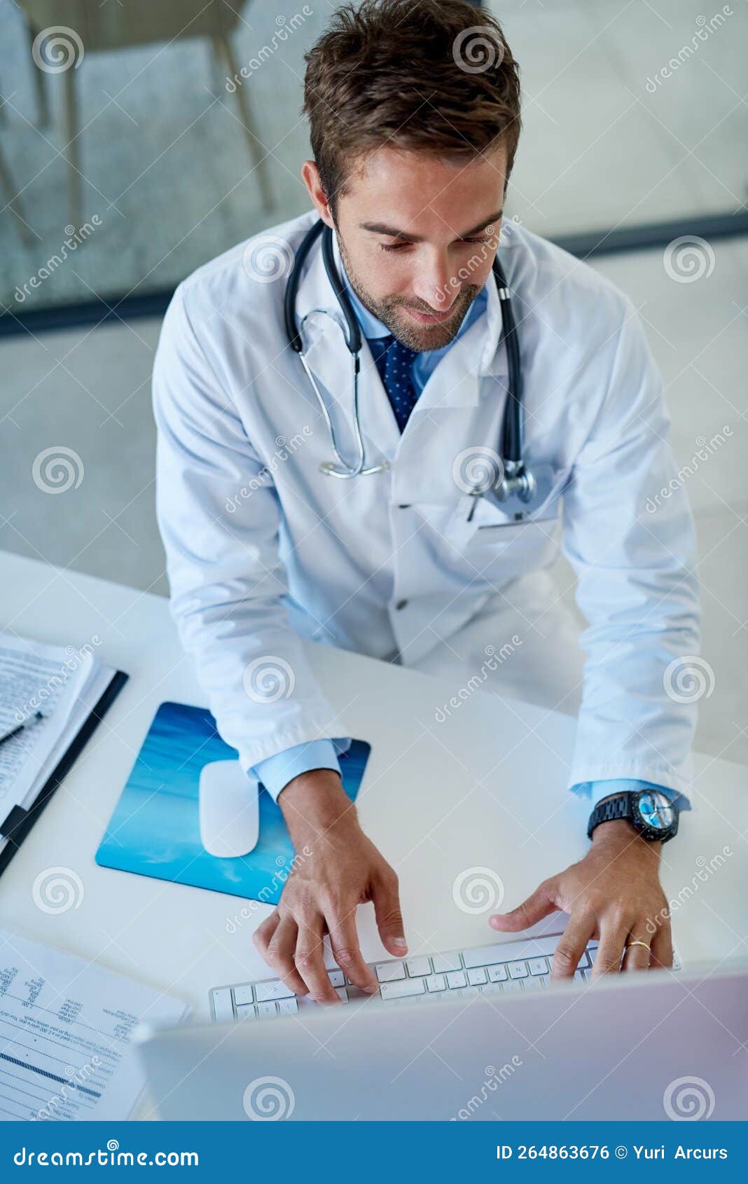 Staying Abreast of New Medical Developments. High Angle Shot of a Young ...
