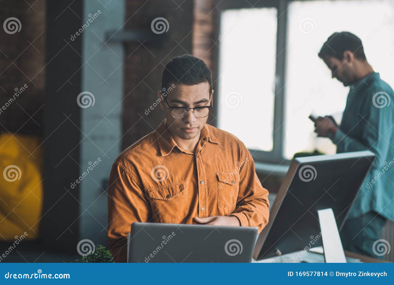 Smart Diligent Young Man Focusing on His Work Stock Photo - Image of ...