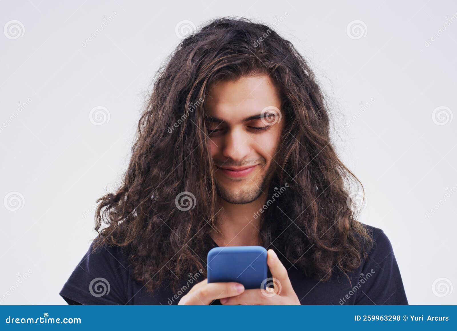 Staying Connected Has Never Been Easier. Studio Shot of a Young Man ...