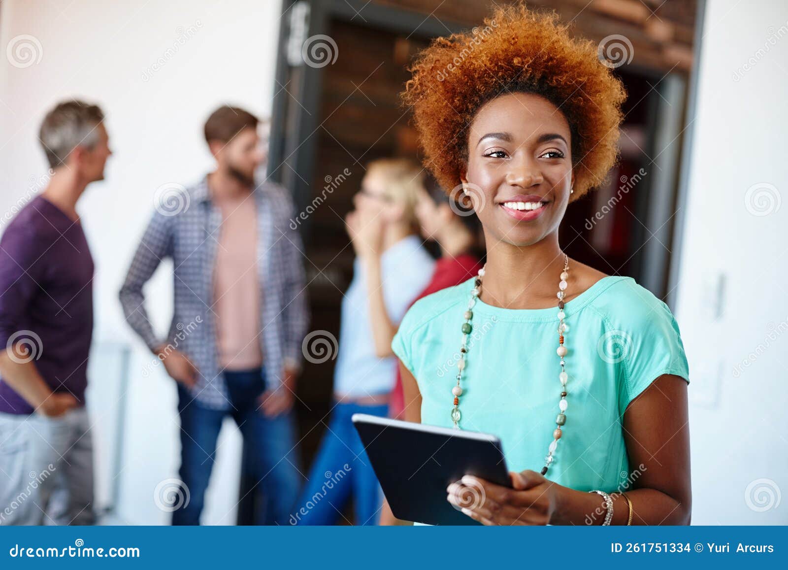 Staying Connected To Success. a Young Designer Using a Tablet with Her ...