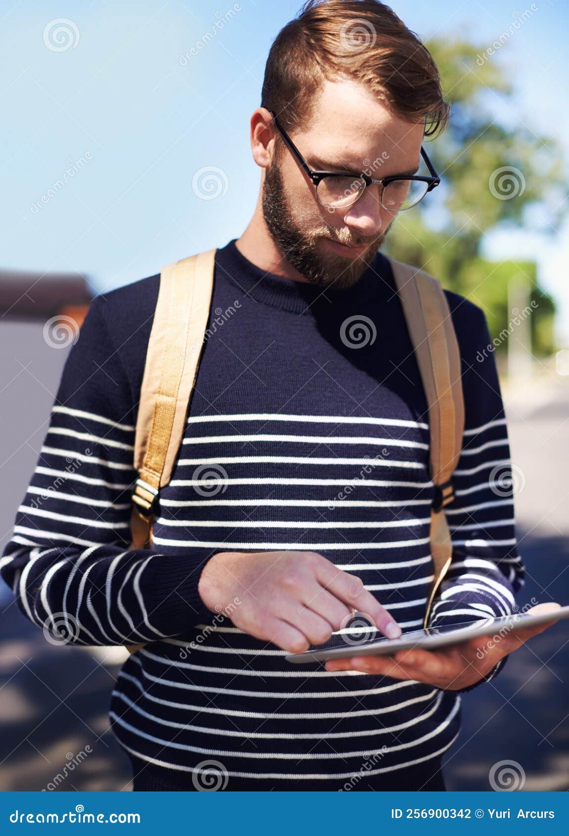 Staying Cool Online. a Hipster Using a Touchscreen Device. Stock Photo ...