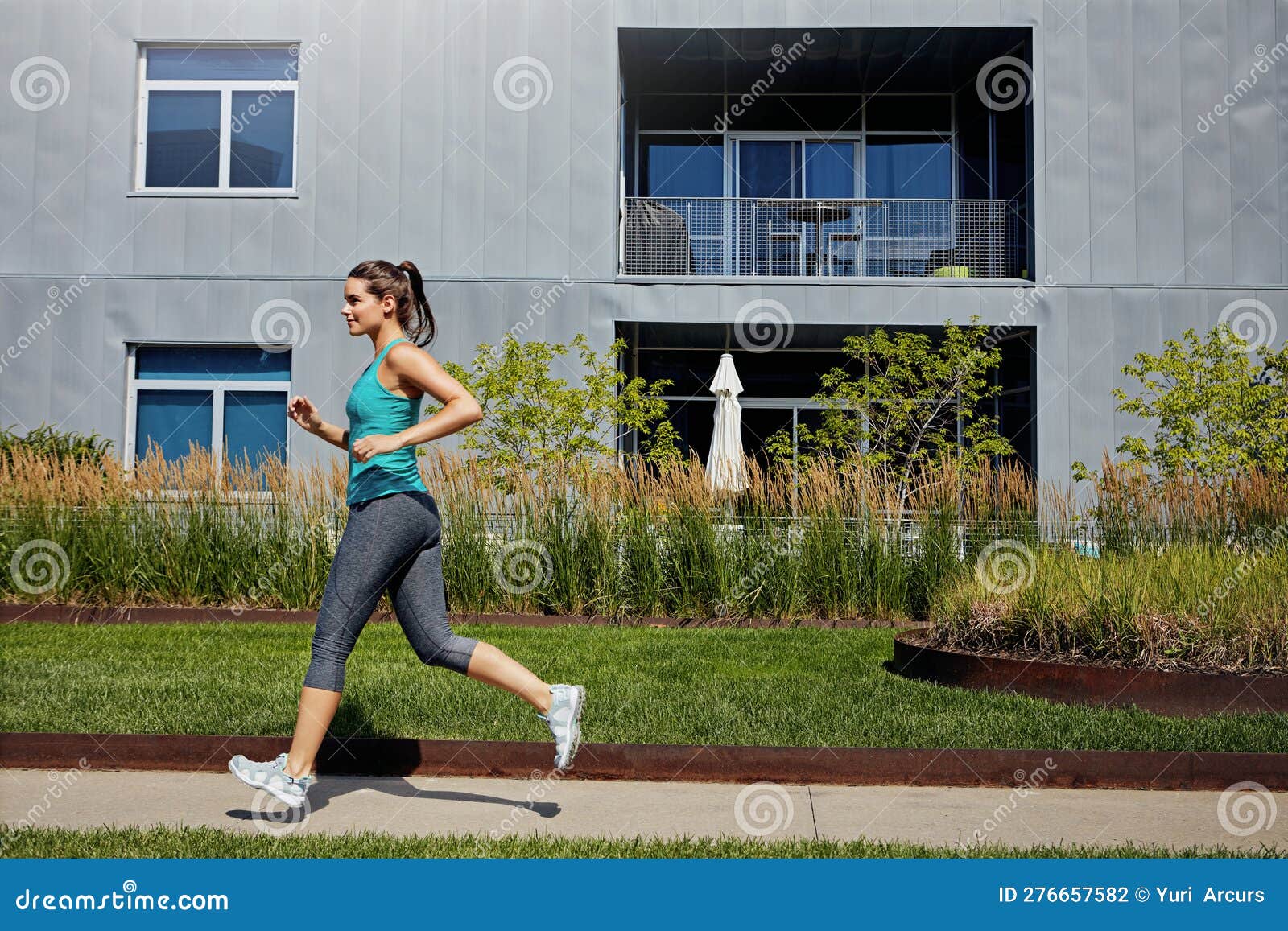 Staying in Shape is a Priority. an Attractive Young Female Runner ...