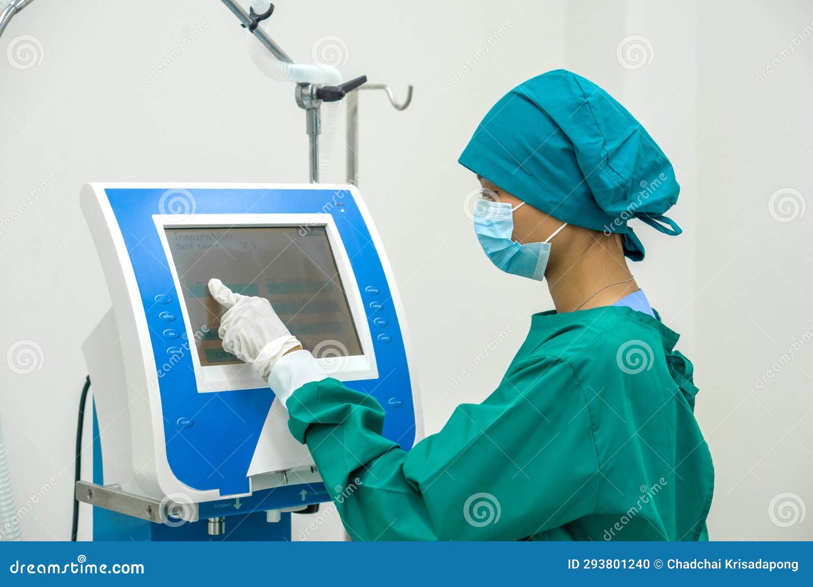 A Steadfast Surgeon, Garbed in Sterile Surgical Attire, is Expertly ...