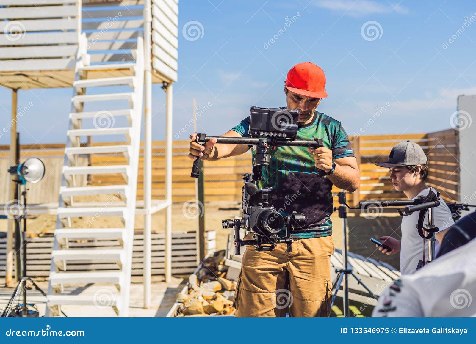 Steadicam Operator and His Assistant Prepare Camera and 3-axis ...