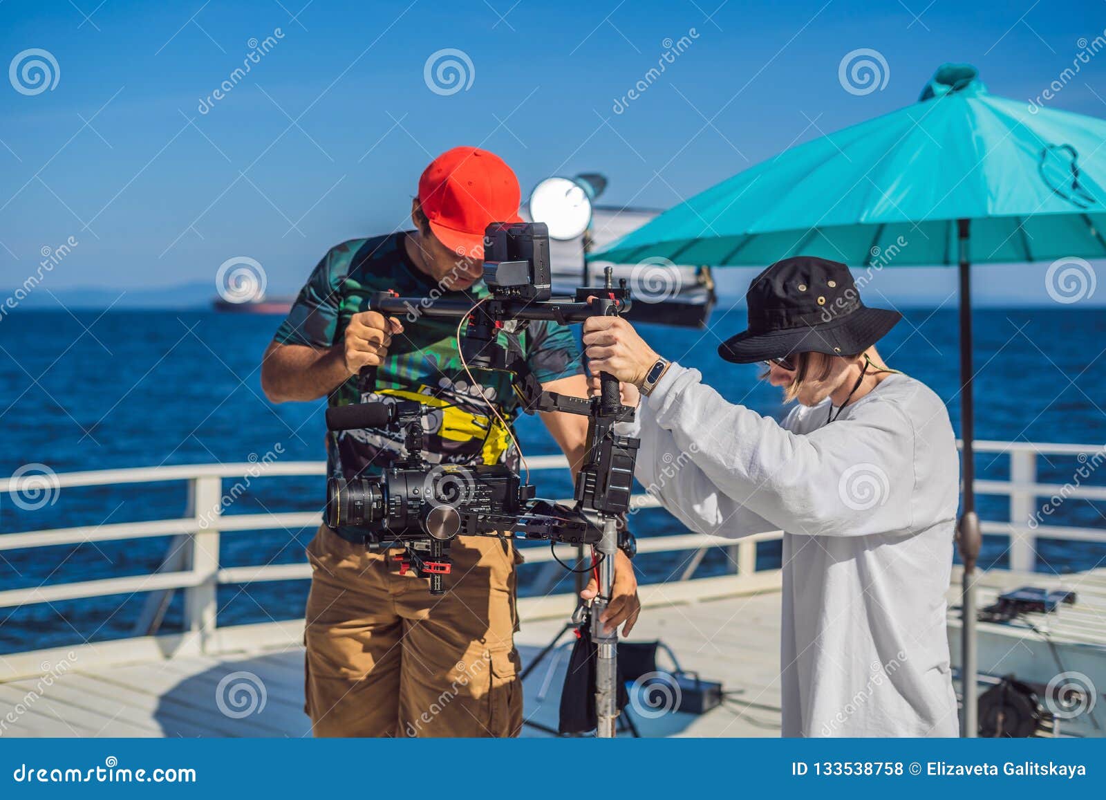 Steadicam Operator and His Assistant Prepare Camera and 3-axis ...