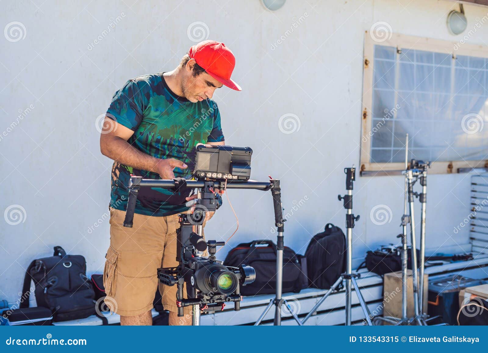 Steadicam Operator and His Assistant Prepare Camera and 3-axis ...