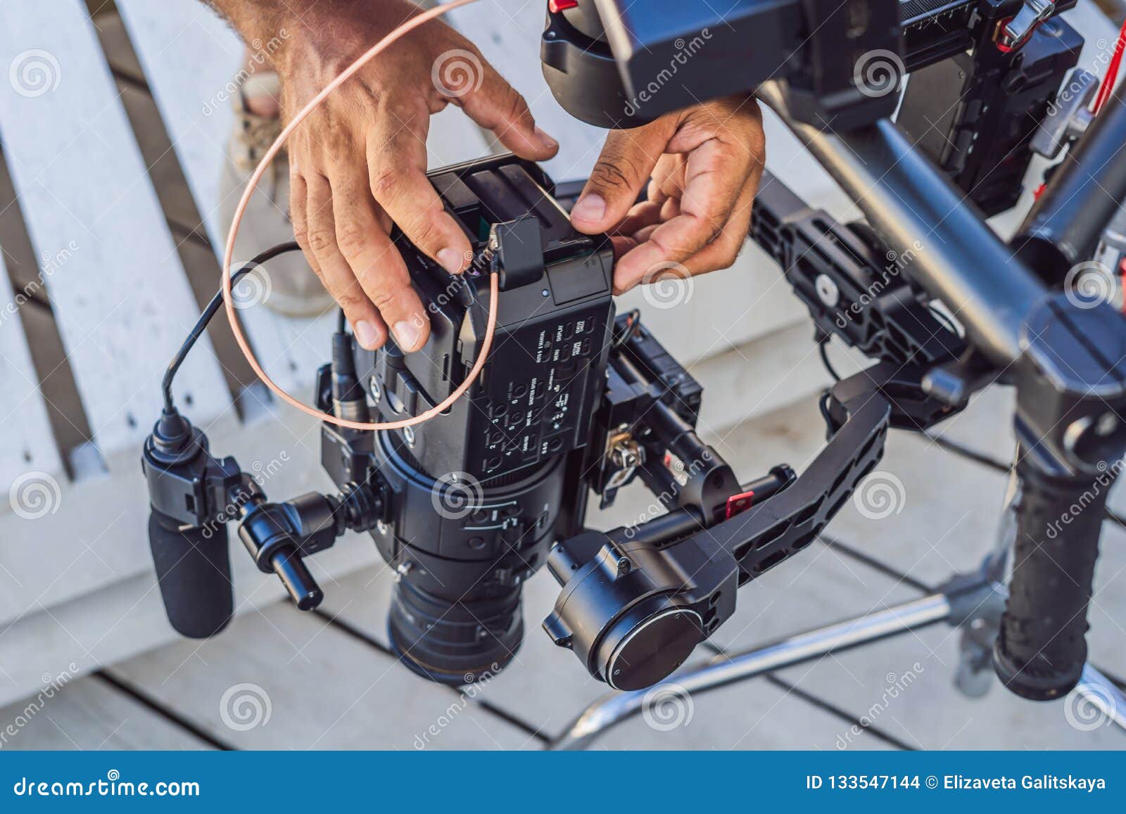 Steadicam Operator and His Assistant Prepare Camera and 3-axis ...