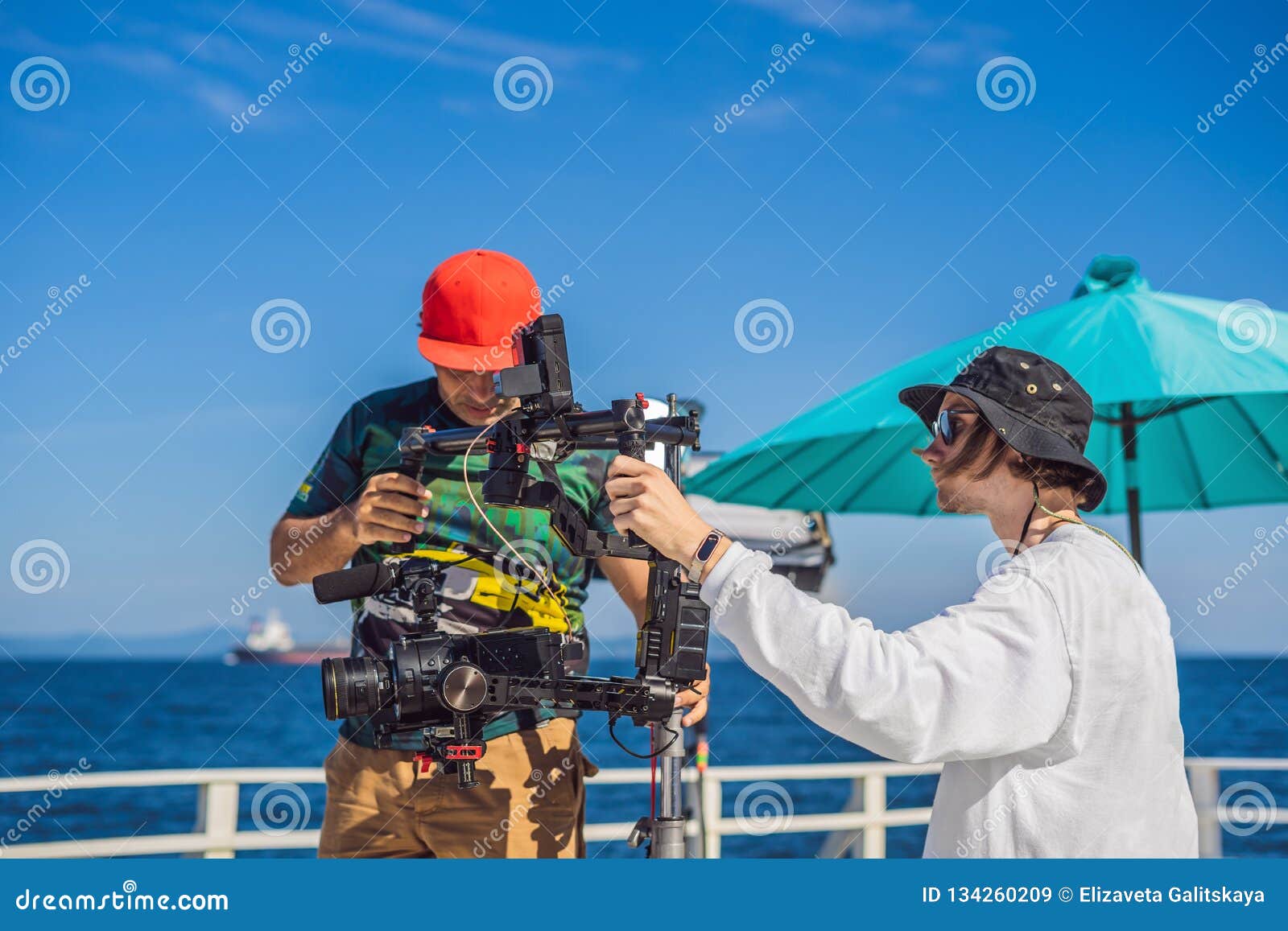 Steadicam Operator and His Assistant Prepare Camera and 3-axis ...