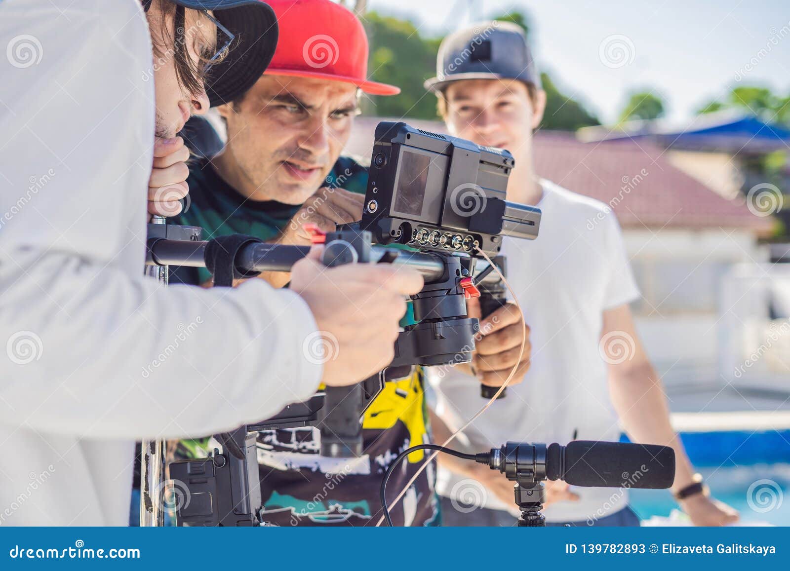 Steadicam Operator and His Assistant Prepare Camera and 3-axis ...