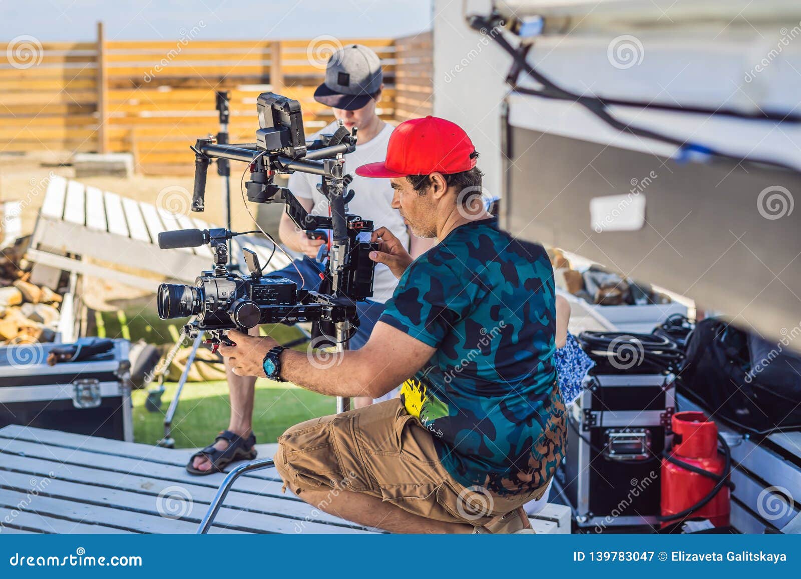 Steadicam Operator and His Assistant Prepare Camera and 3-axis ...