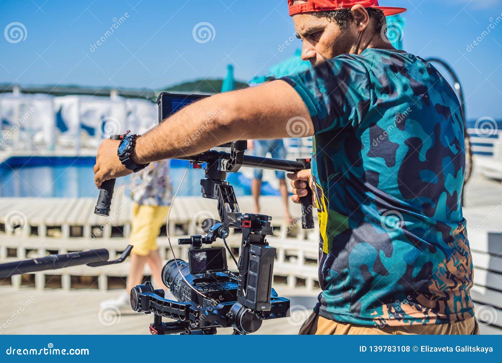 Steadicam Operator and His Assistant Prepare Camera and 3-axis ...