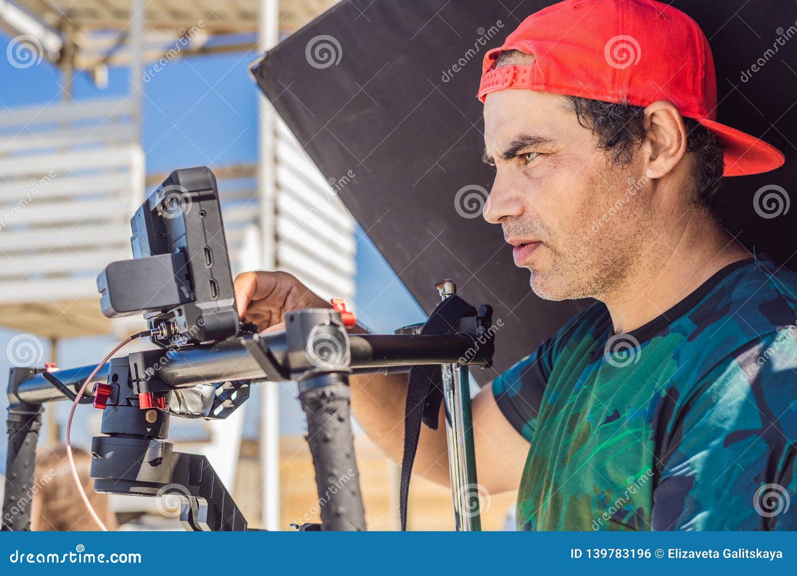 Steadicam Operator and His Assistant Prepare Camera and 3-axis ...