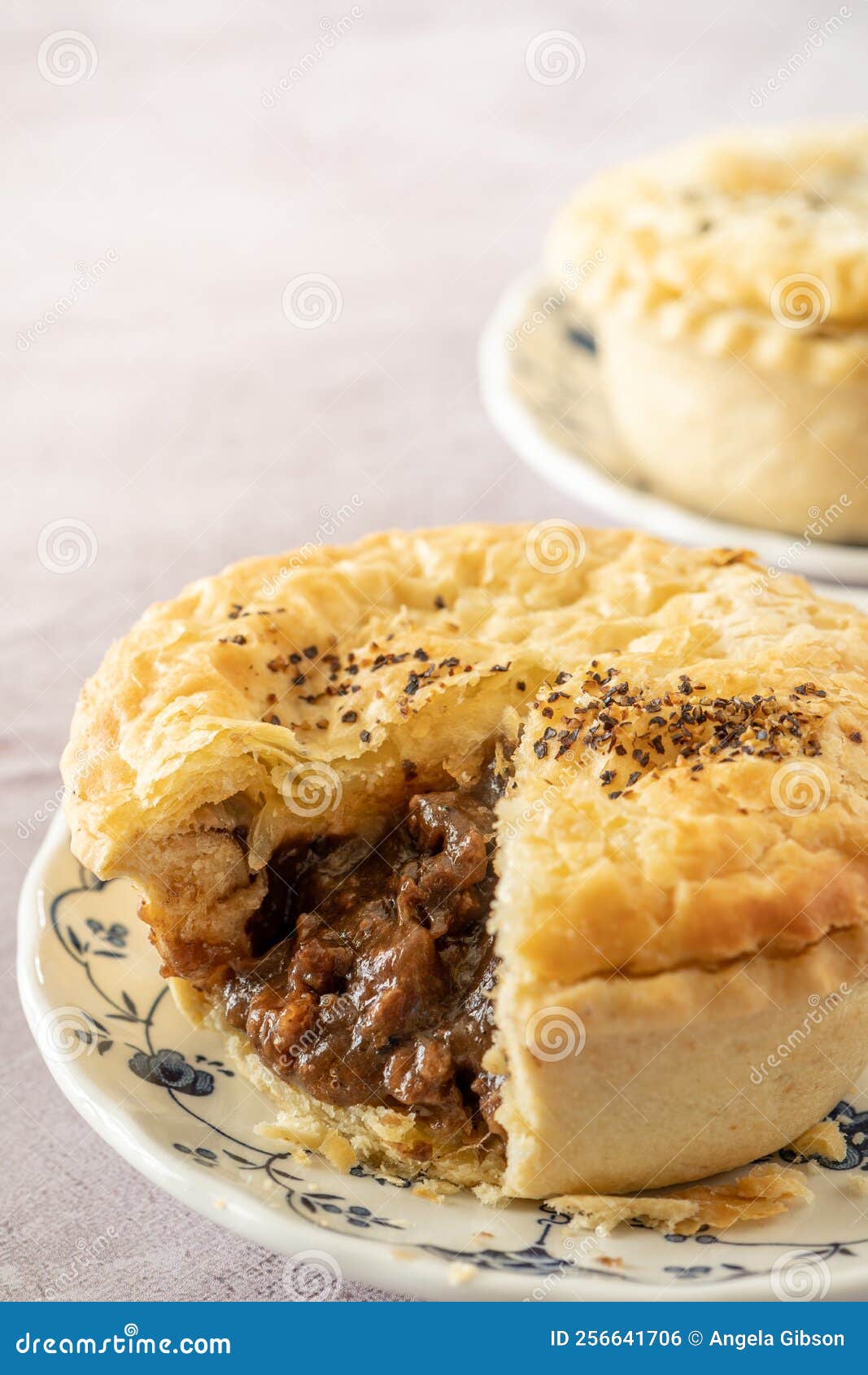 Steak and Black Pepper Pie Vertical Stock Photo - Image of meal, table ...