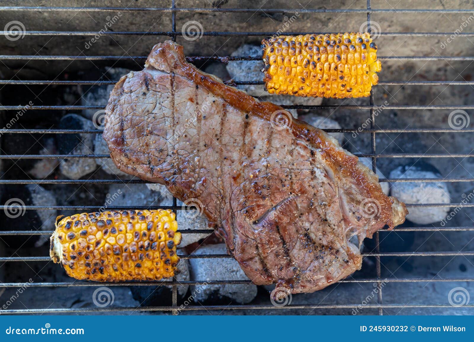 Steak and Corn Cooking Over Coals Stock Photo - Image of corn, cook ...