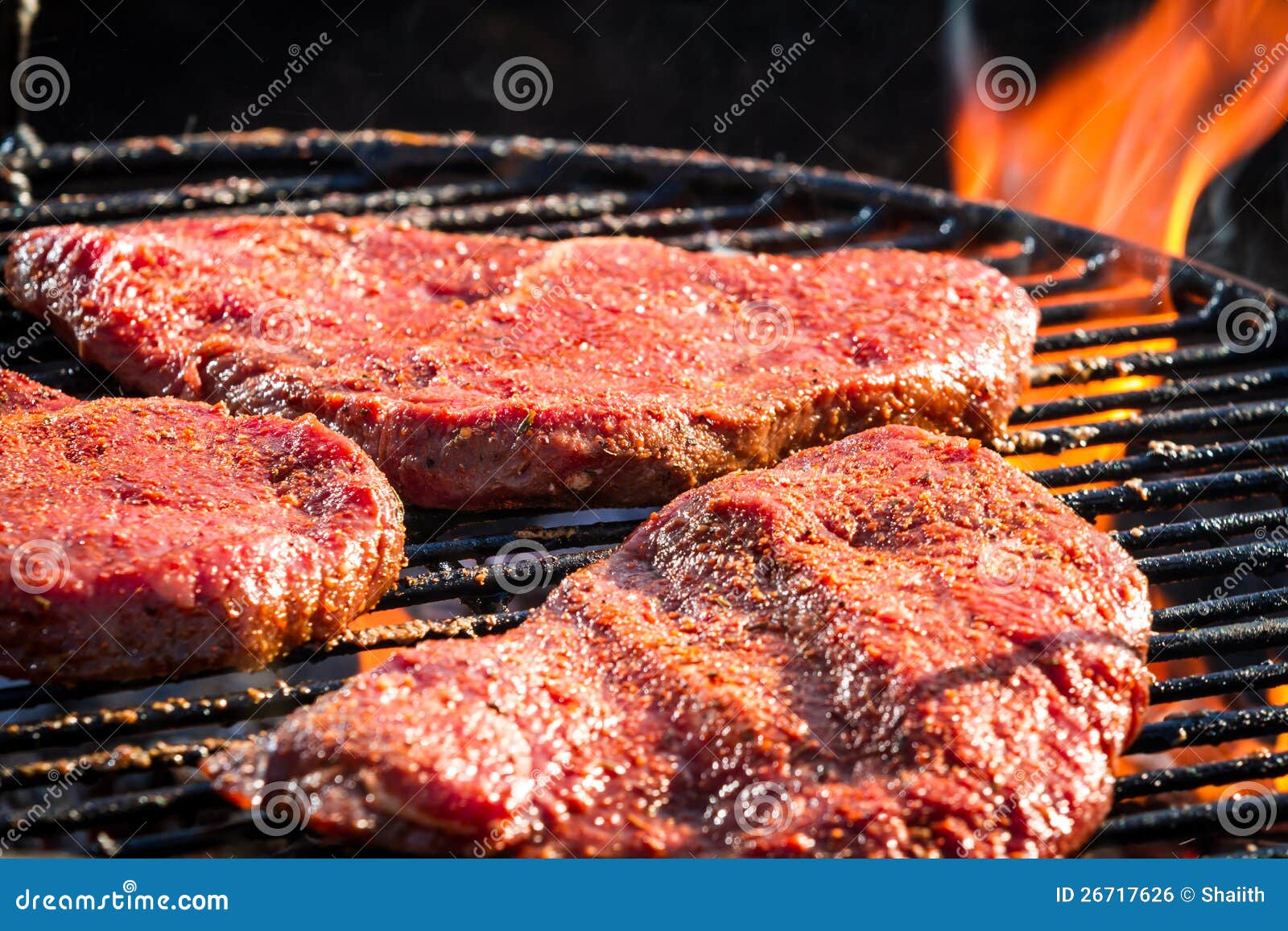 Steak on Grill Fire-toasted Stock Photo - Image of grilled, sirloin ...