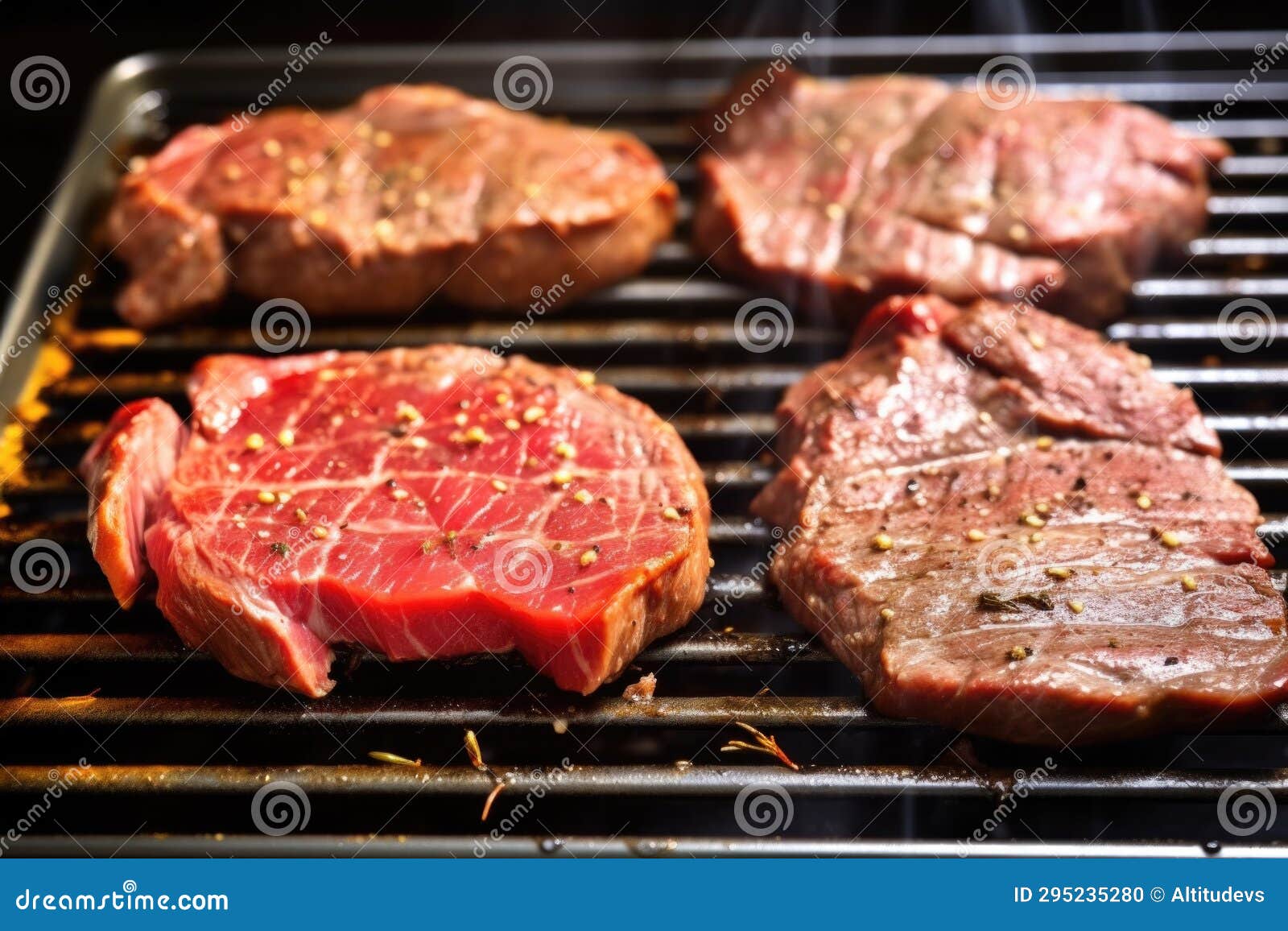 Steak Halves Display Grill Marks on a Steel Plate Stock Photo - Image ...